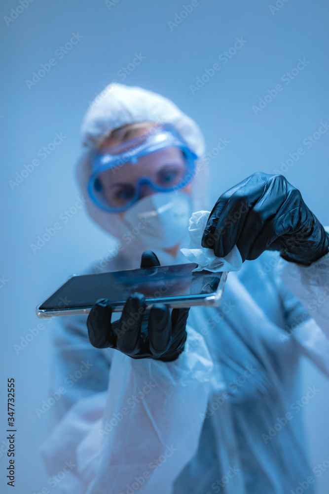 Medical doctor, scientist in full body suit for prevention from viruses ...