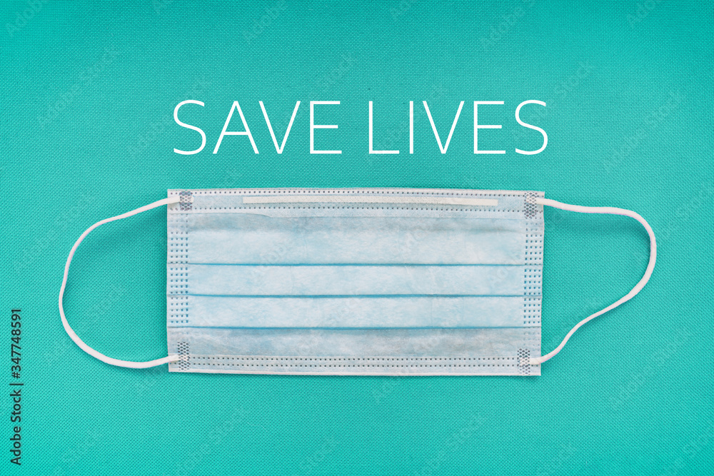 COVID-19 Coronavirus mask sign with text "SAVE LIVES" media message for ...