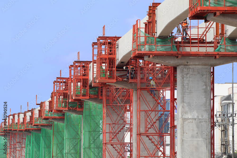 Workers Installing Alignment Tools for Concrete Beams of Sky Train ...