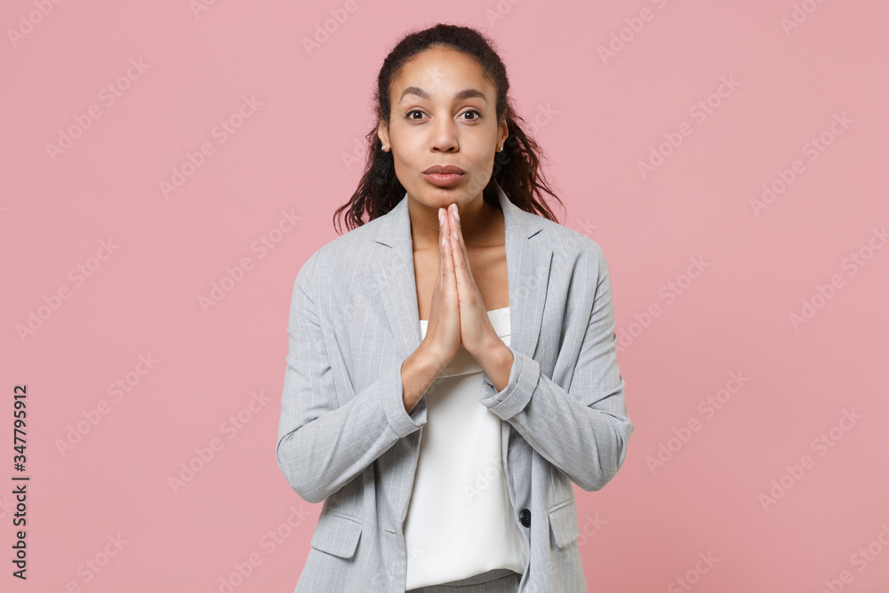 Young african american business woman in grey suit, white shirt posing ...