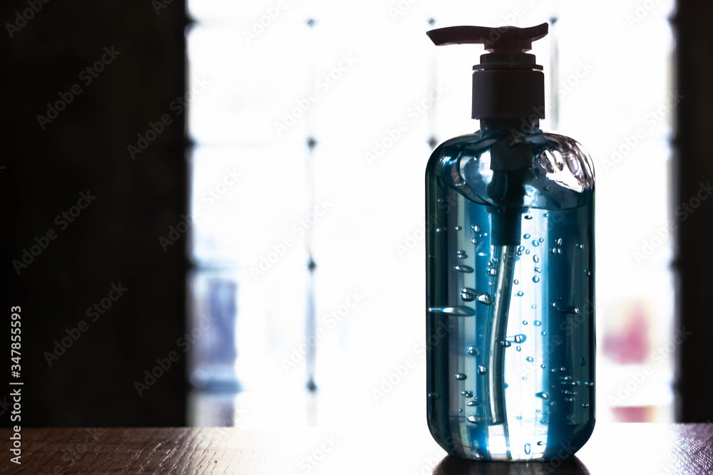 Washing hands with alcohol gel. Sanitizer after using a public restroom ...