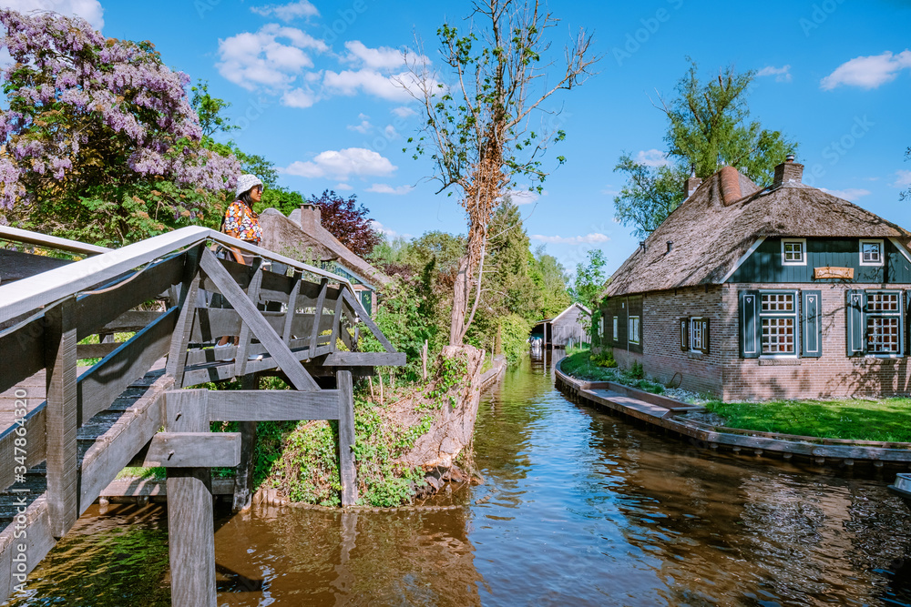 GIETHOORN, NETHERLANDS,view of typical houses of Giethoorn on May 2020 ...