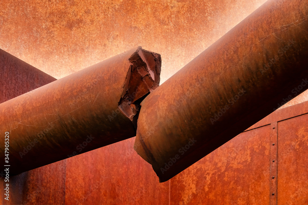 Broken off rust-coloured concrete column on a facade Stock Photo ...