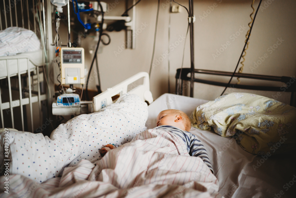 Baby at the hospital sick with a virus coronavirus covid19 Stock Photo ...