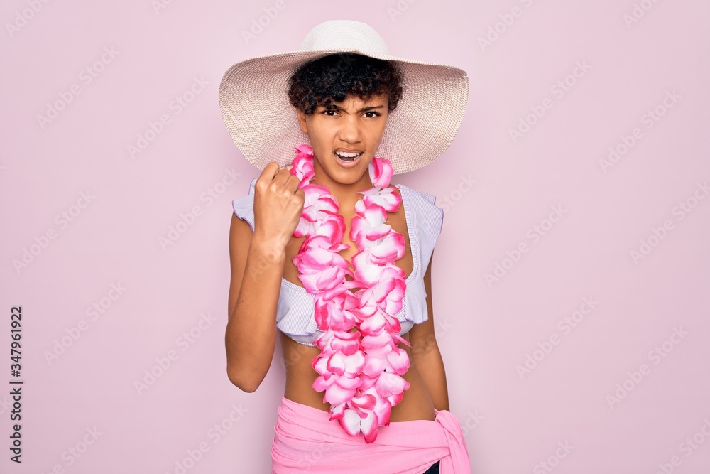 Young beautiful african american tourist woman wearing bikini and ...