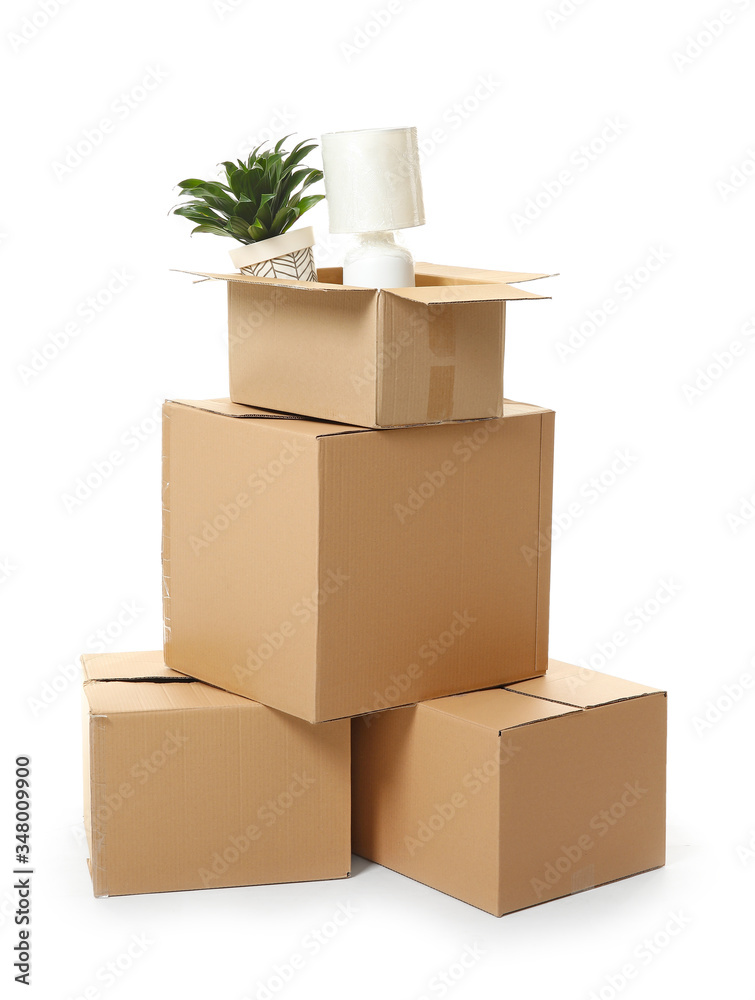 Moving boxes with belongings on white background Stock Photo | Adobe Stock