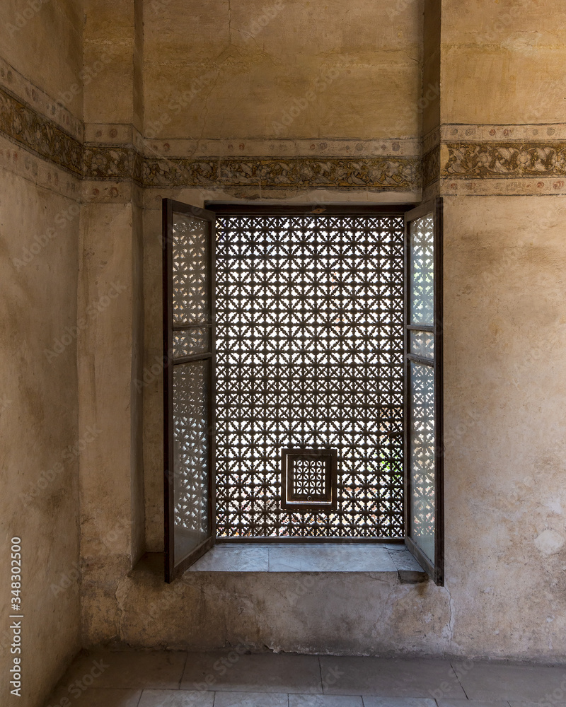 Vintage window with wooden arabesque ornaments - Mashrabiya - located ...