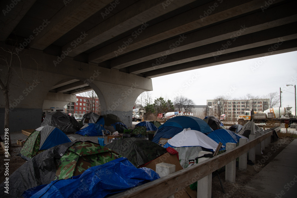 Homeless camp under bridge no sign Stock Photo | Adobe Stock