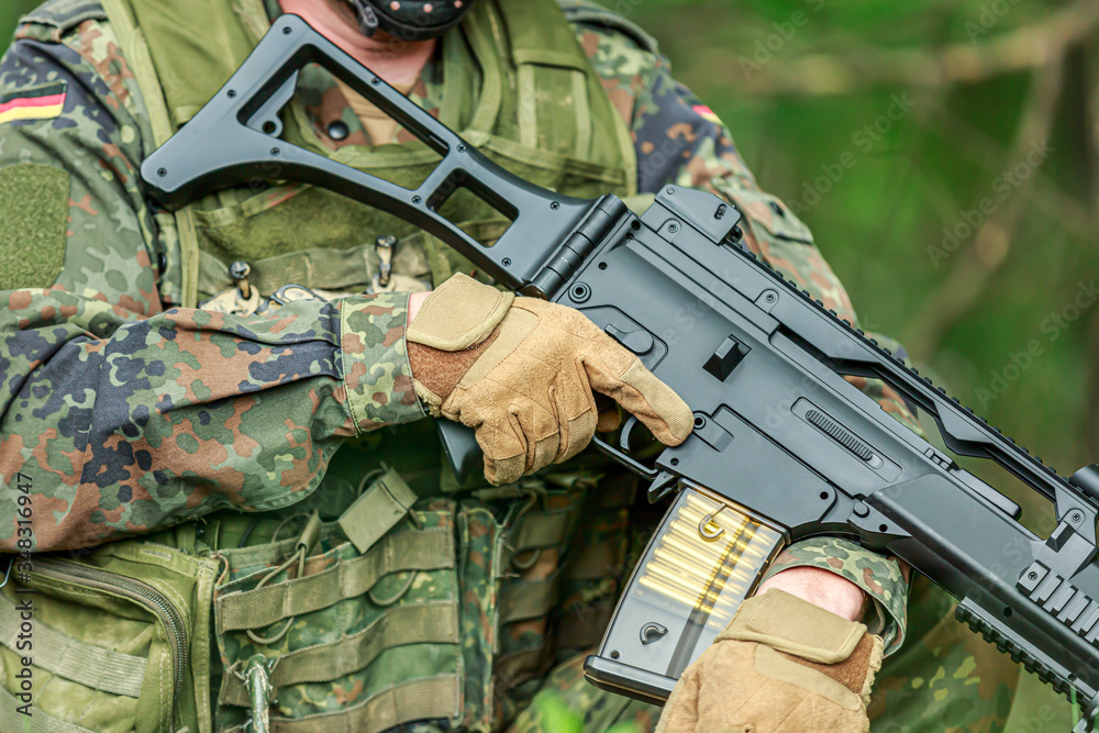 German soldier with a german assault rifle Stock Photo | Adobe Stock