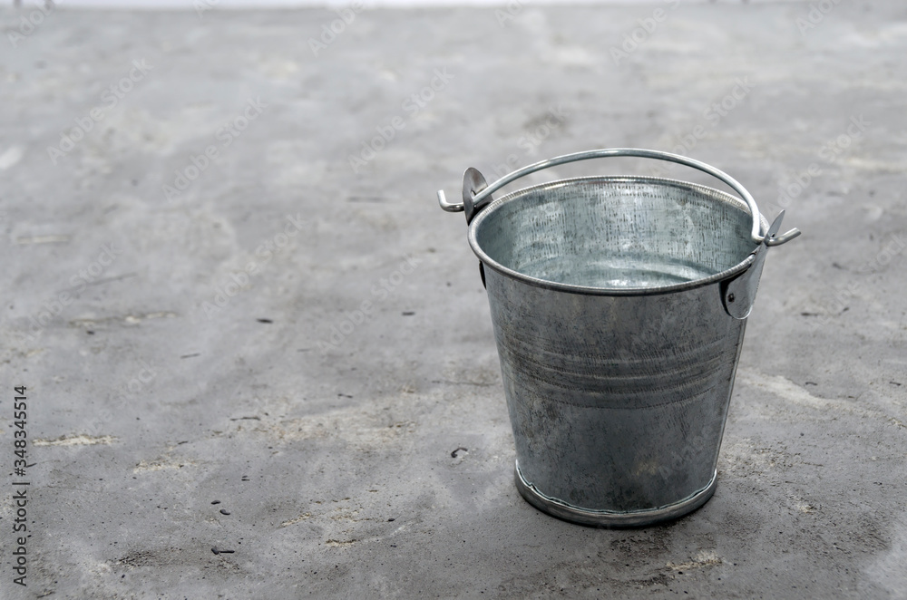mini galvanized bucket on a gray background. Aluminum bucket for a ...