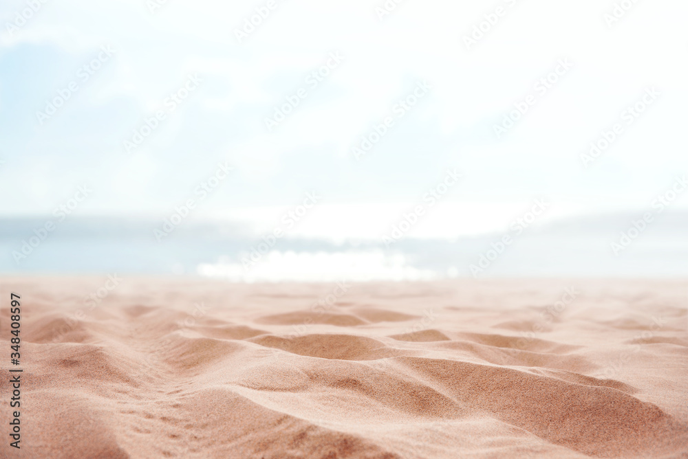 Tropical summer sand beach and bokeh sun light on sea background, copy ...