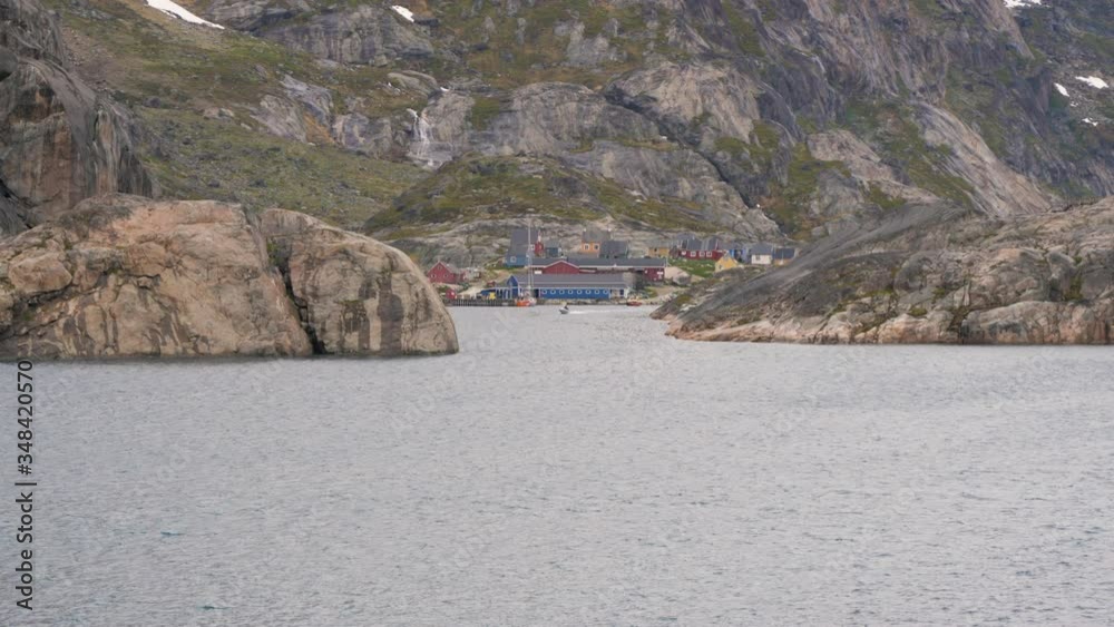 A remote and secluded tiny village of colourful houses on the side of a ...