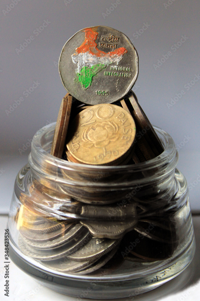 Two rupee coin of India isolated on white background. Map of India as a ...