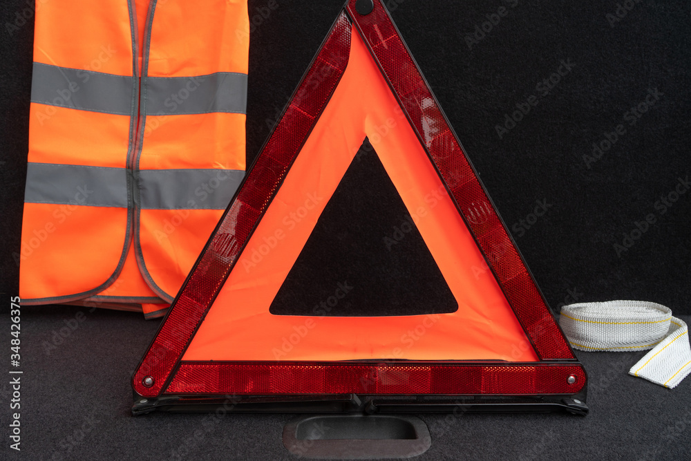 Red triangle road safety and fluorescent reflective vest, tow rope, the ...