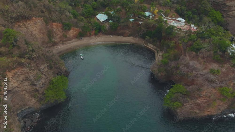 Epic aerial of Monos island and beach in the Bocas Del Dragon region of ...
