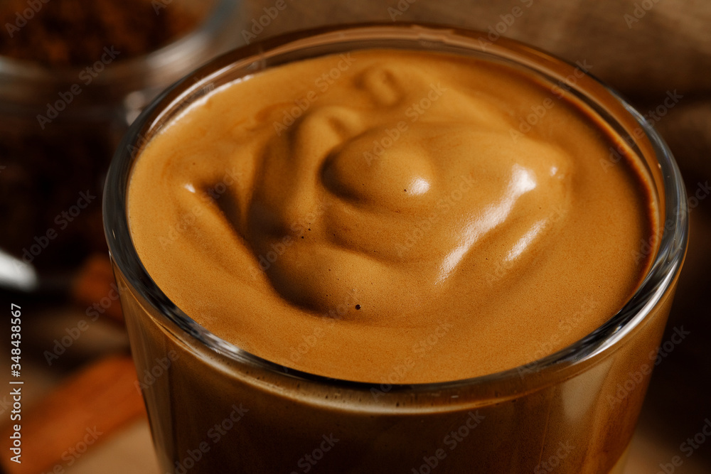 Dalgona coffee - the Korean coffee drink on wooden background. Instant ...