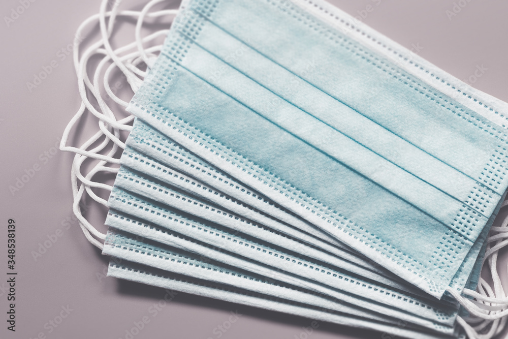 Protective medical face masks. Personal protective equipment shortage ...