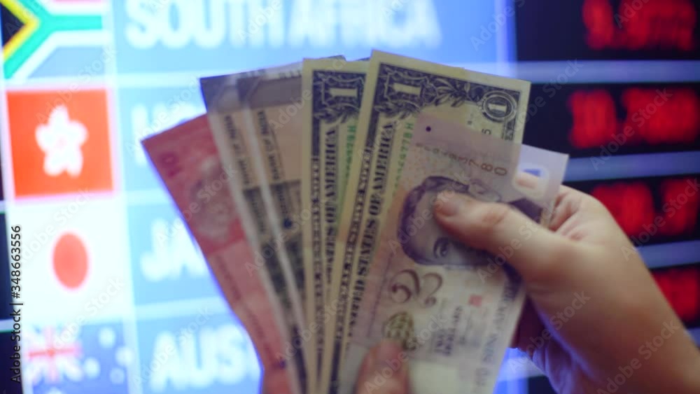 Panning shot of hands holding multiple currency notes like american ...