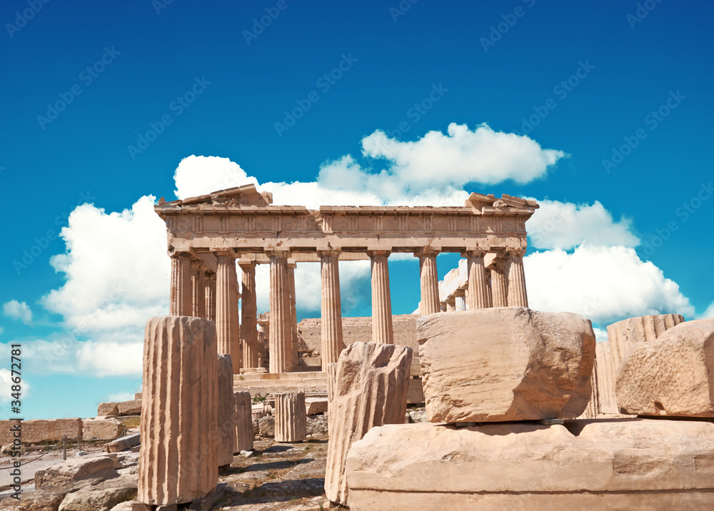 Parthenon temple on a bright day with blue sky and clouds. Panoramic ...