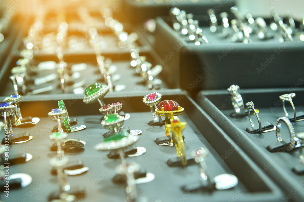 Gold jewelry diamond shop with rings luxury retail store window display ...