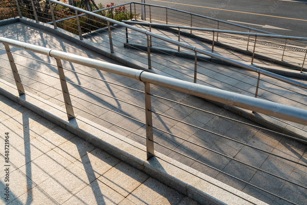 A wheelchair ramp, an inclined plane installed in addition to or ...