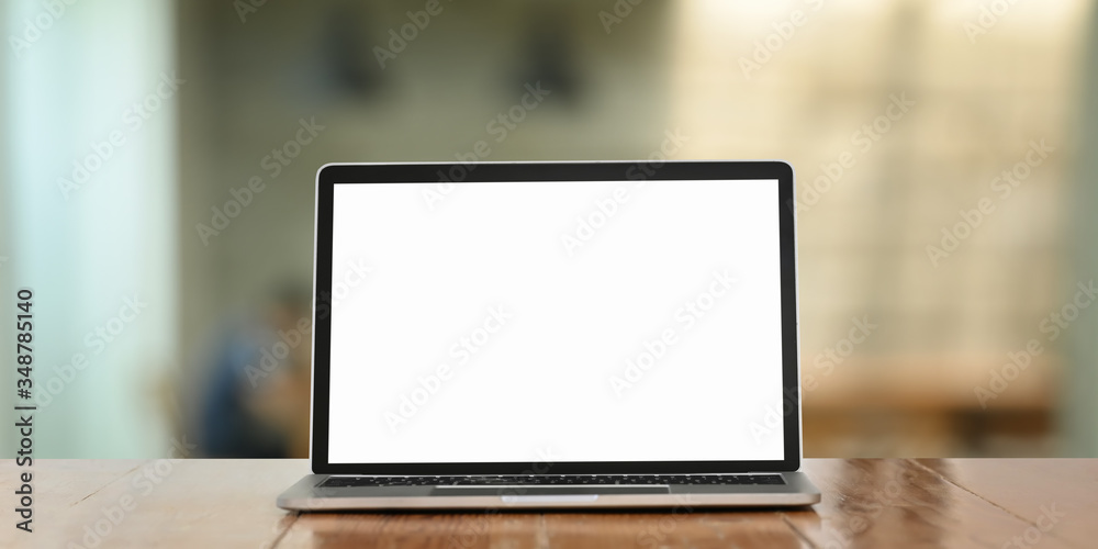 Photo of white blank screen computer laptop putting on working desk ...