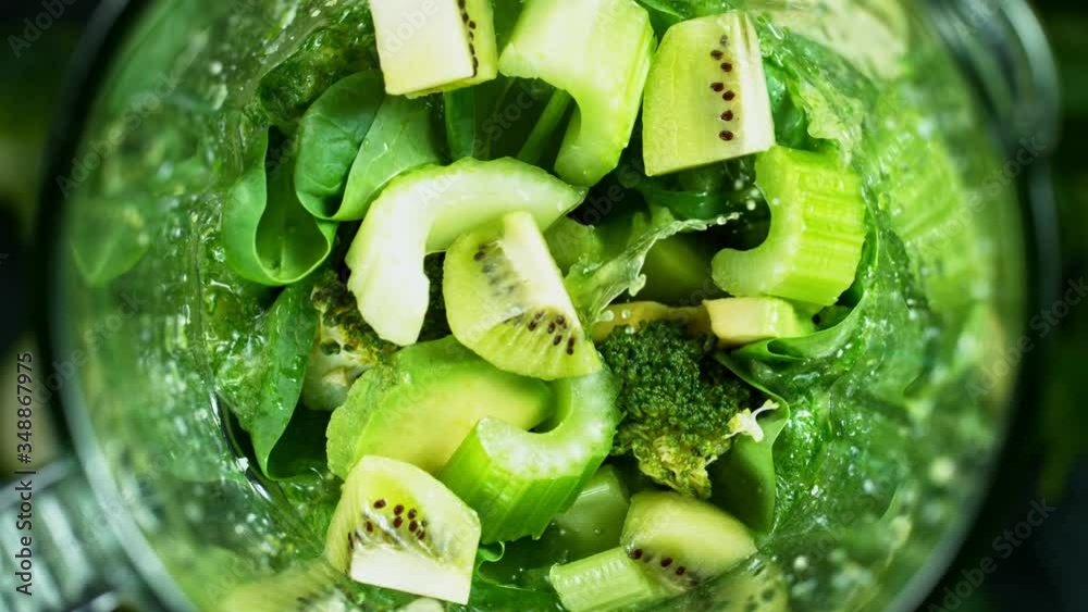 Green fresh smoothie blended in blender, top view. Healthy eating ...