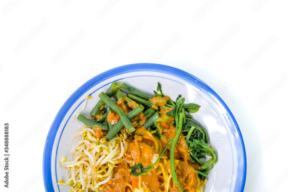 "Bakmie Pecel", a traditional food from Indonesia. It is made of a ...