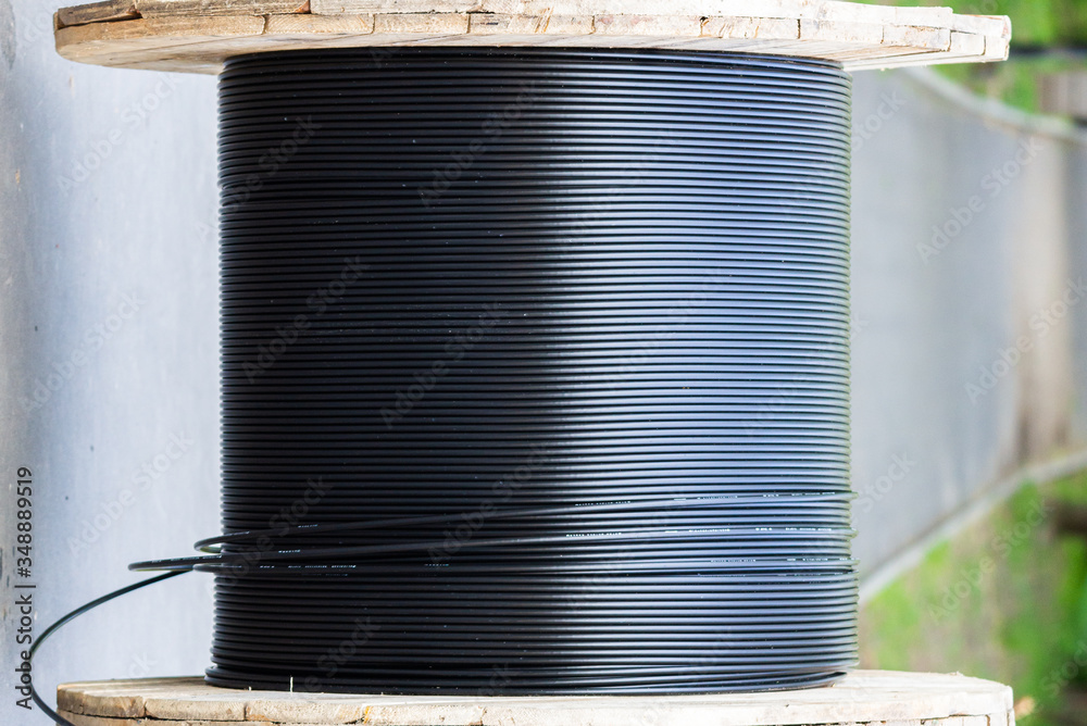 Cable drum, fiber-optic and technology Stock Photo | Adobe Stock