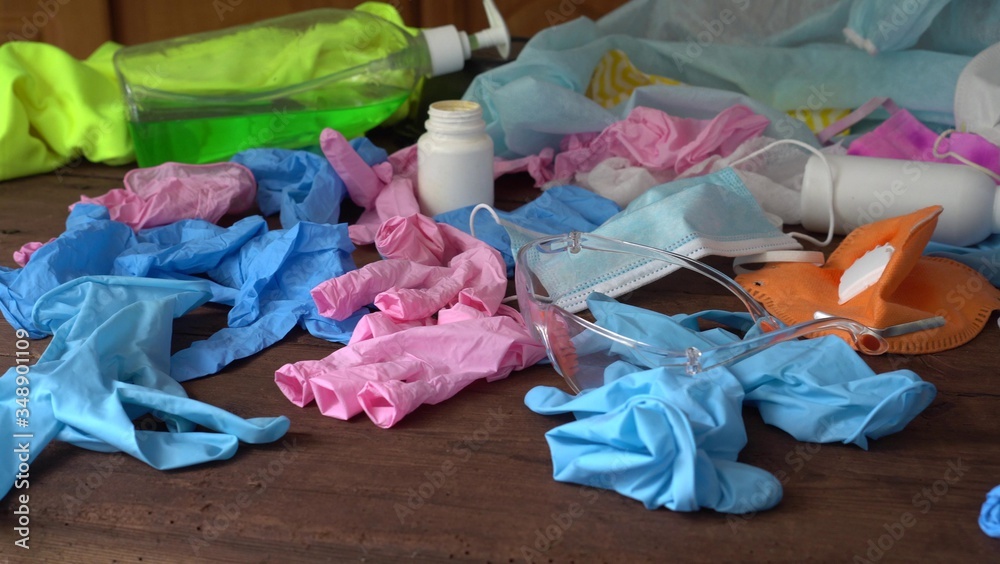 Used personal protective equipment (PPE) waste (gloves, single-use ...