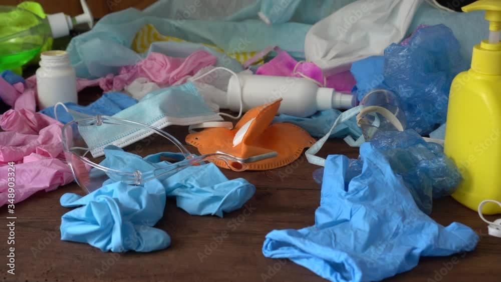 Used personal protective equipment (PPE) waste (gloves, single-use ...