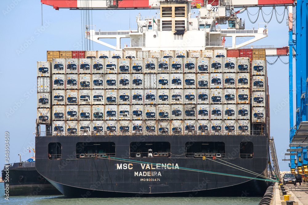 Large Container ship loaded with stacks of refrigerated containers ...