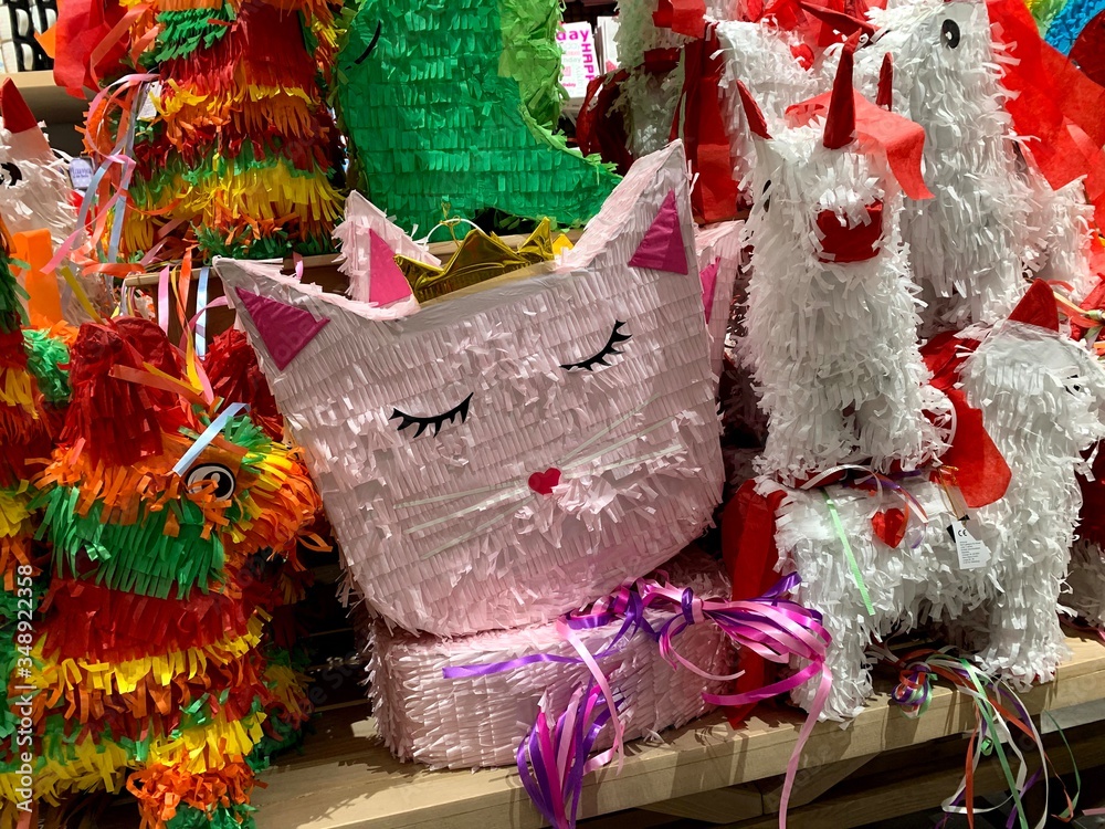 Colorful pinatas used in birthdays and Mexican celebrations, filled ...