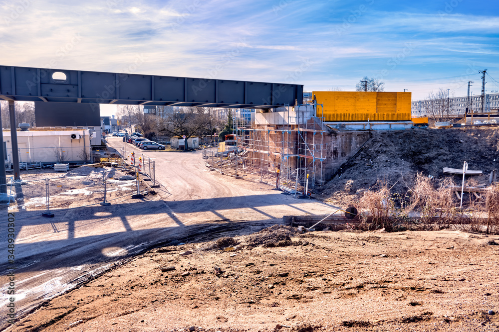 Construction site of a bridge, scaffolding and cladding, blue sky Stock ...