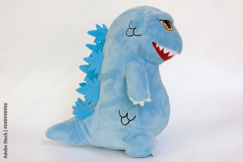 Blue Godzilla doll on white background Stock Photo | Adobe Stock