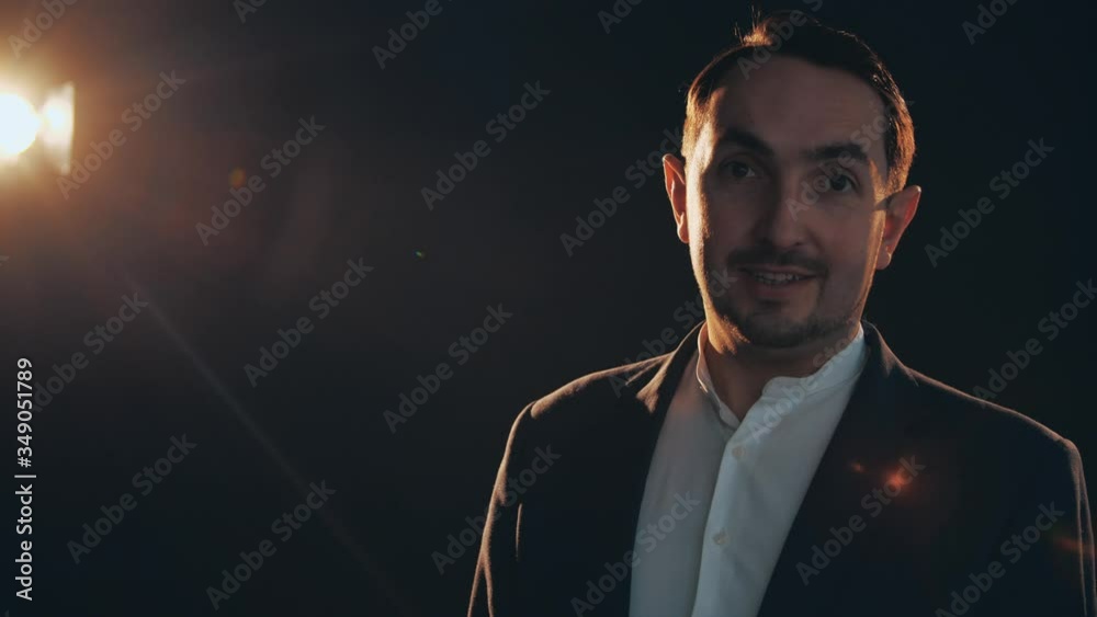 Young funny man, looking at the camera with silly stupid face ...