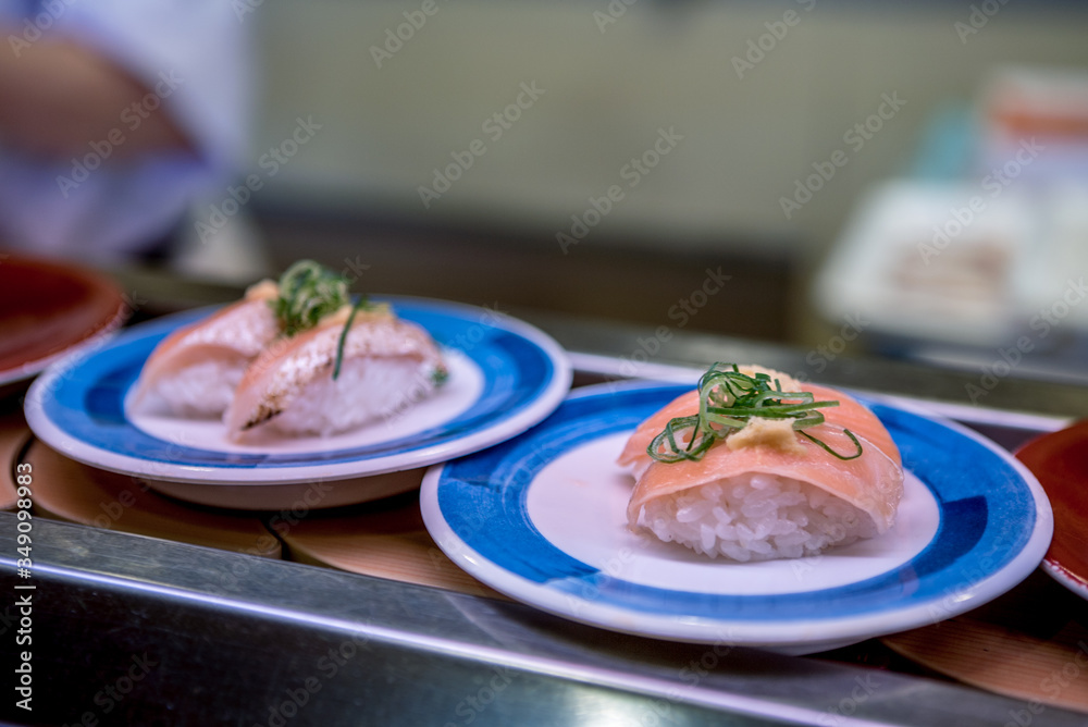 Sushi on conveyor belt in Japan restaurant. Traditional Kaitenzushi ...