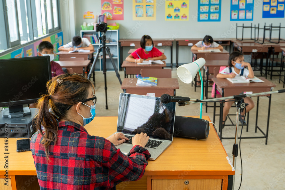 Teacher wearing protective mask to Protect Against Covid-19,Group of ...