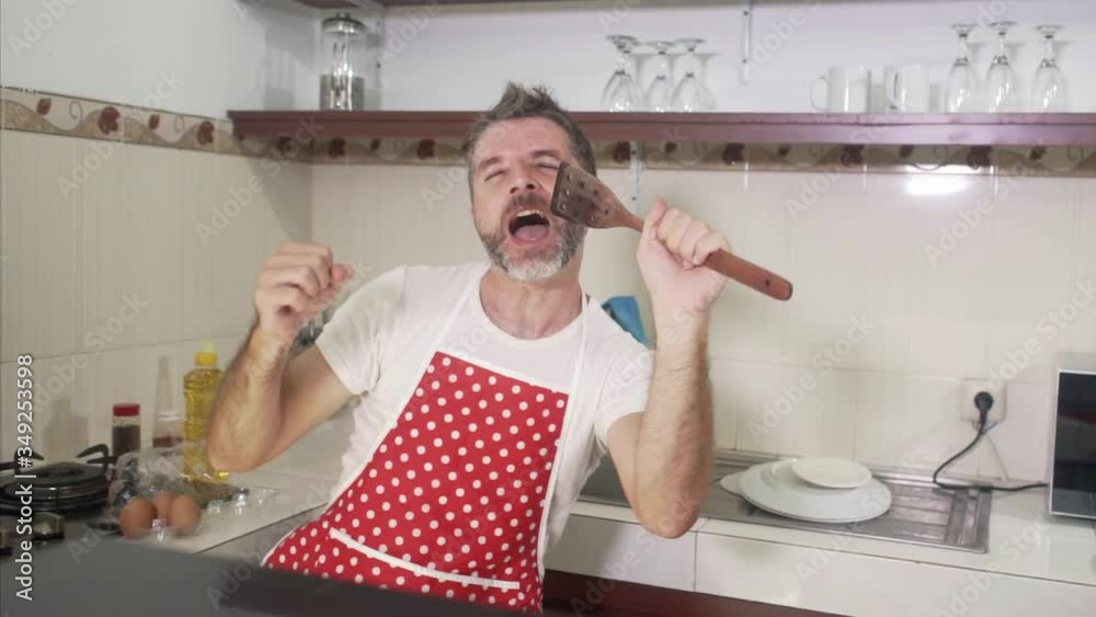 SLOW MOTION singing in kitchen - young cool and attractive man in red ...