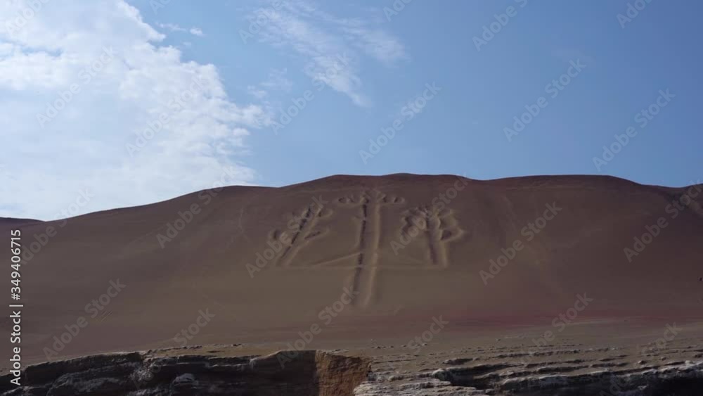 Famous coastal Nazca lines Paracas Candelabra seen from the ocean, slow ...