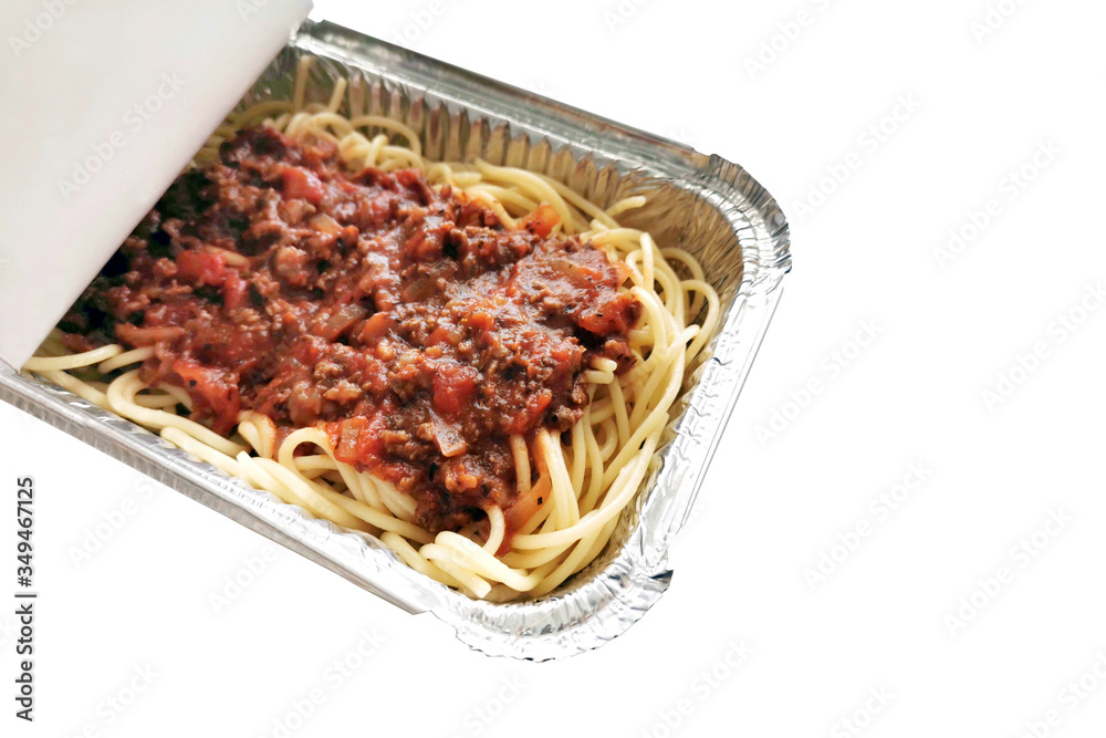 Spaghetti bolognese in aluminium foil box isolated on white background ...
