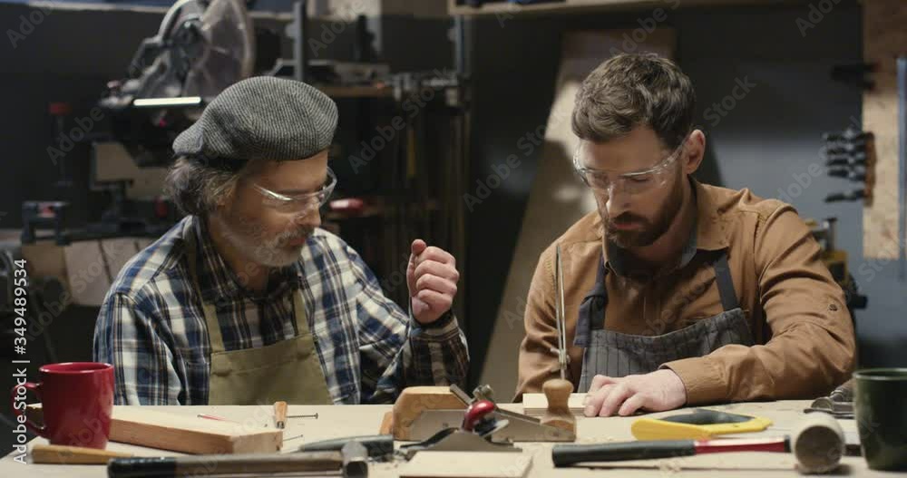 Family of carpenters. Male generations of handicraftsmen. Old father ...