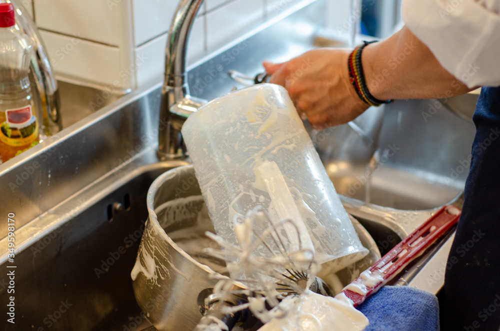 chef hand washing utensils professional kitchen Stock Photo | Adobe Stock