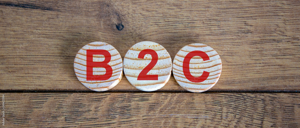 'B2C' simbols on wooden alphabet circles. New normal concept. Beautiful ...
