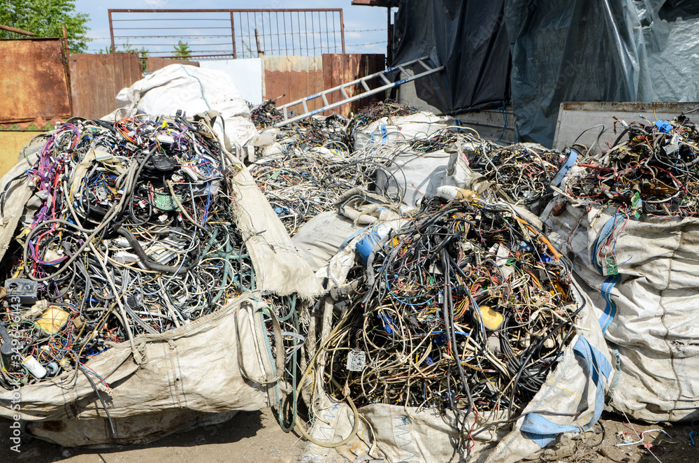 Electronic waste ready for recycling. Metal pile of scrap copper ...