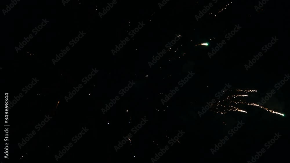 People launching a Chinese sky fly fire lantern in the night sky to ...