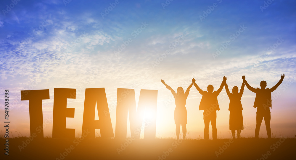 Silhouette of happy business teamwork making high hands over head in ...