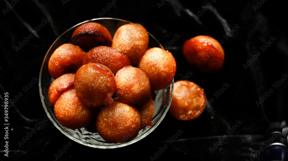 Homemade Kerala sweet snack, delicious Kerala snack unniyappam in dark ...