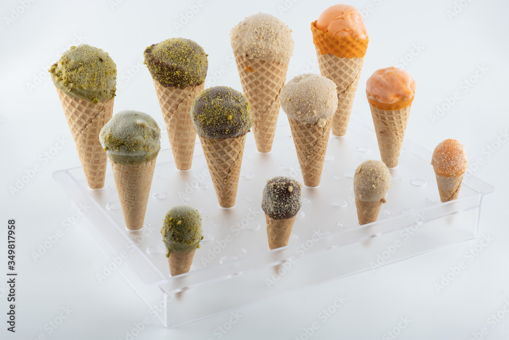 organic handmade ice cream cones in four flavors and different sizes on ...