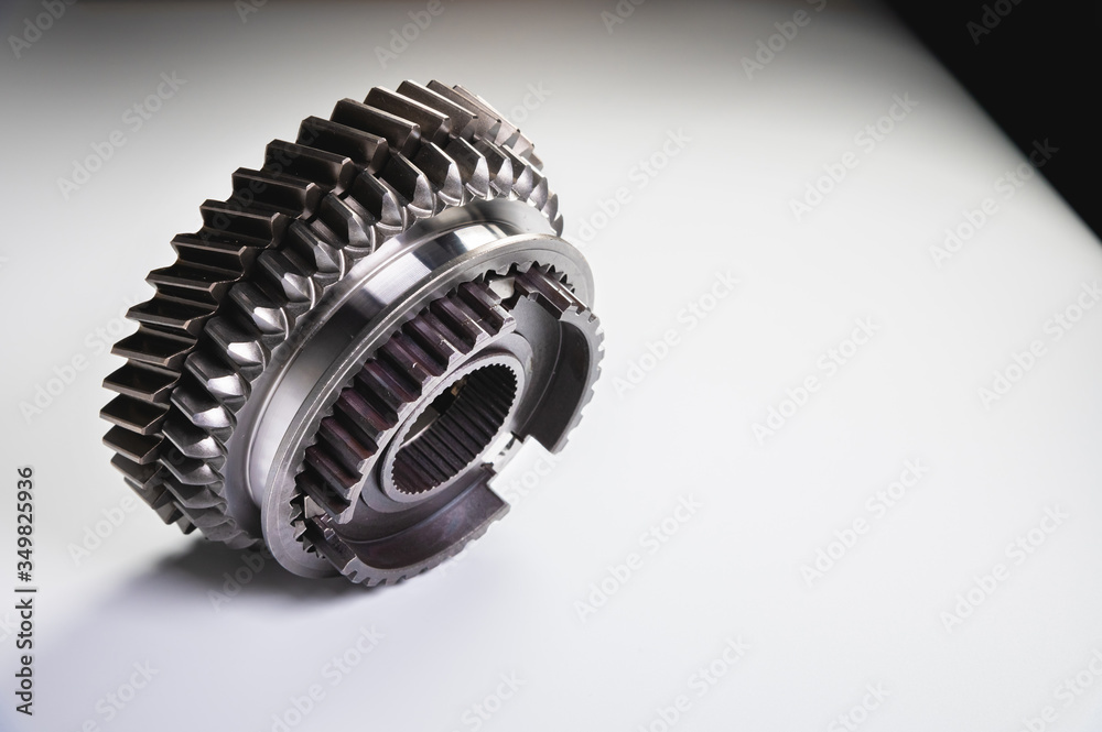 New parts on a gray background. Gears of gear shifting torque ...